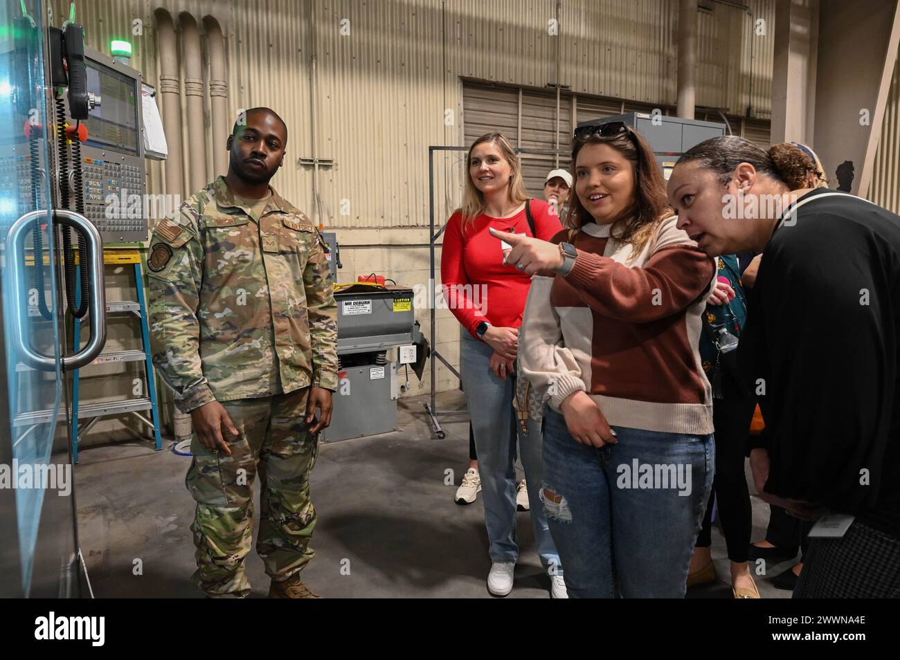 Spouses from the 33rd Fighter Wing tour maintenance backshops during an ...