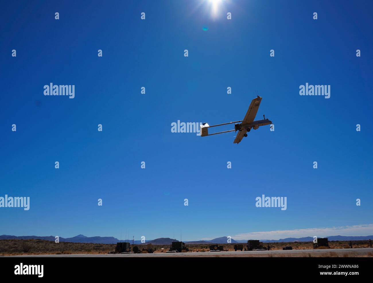 An AAI RQ-7 Shadow unmanned aerial vehicle is launched by U.S. Army ...