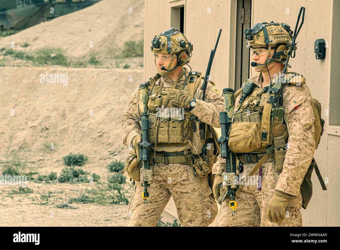 U.S. Marine Corps Lance Cpl. Justin Grunow, left, a rifleman and 1st Lt ...