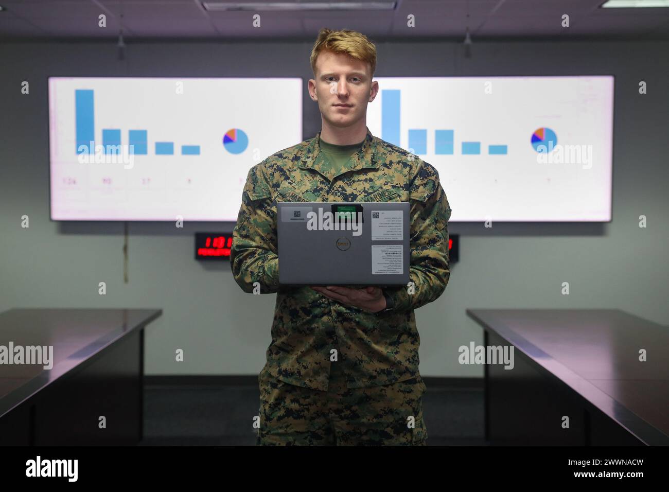 U.S. Marine Corps Lance Cpl. Alexzander Harden, a legal services ...