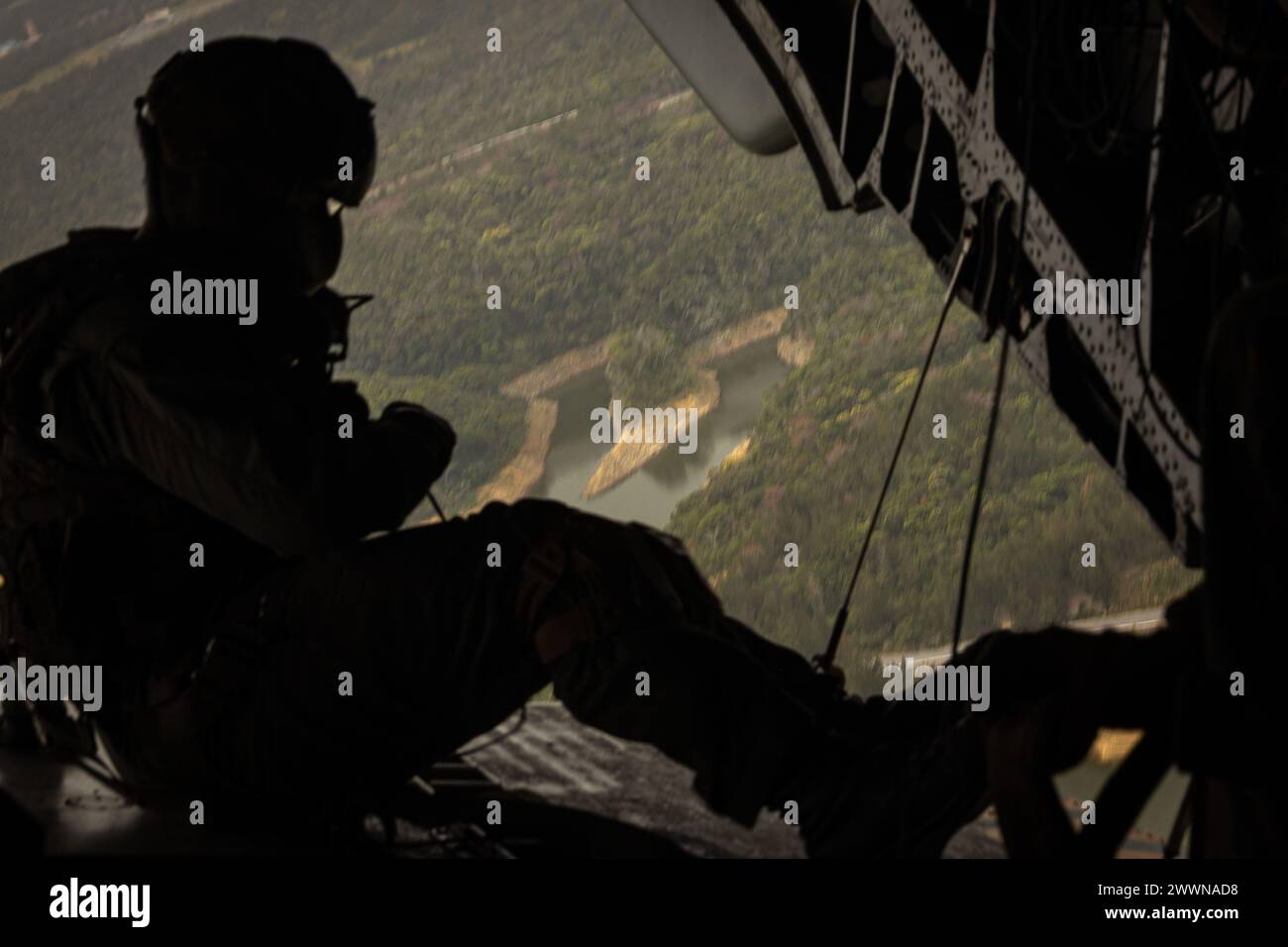 U.S. Marine Corps Cpl. Christopher Edwards, a flight crew member with ...