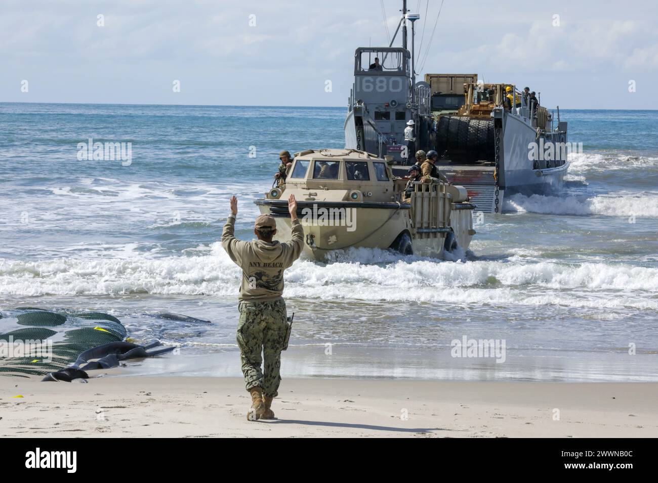 U.S. Navy Sailors assigned to Beachmaster Unit 1 and the Amphibious ...