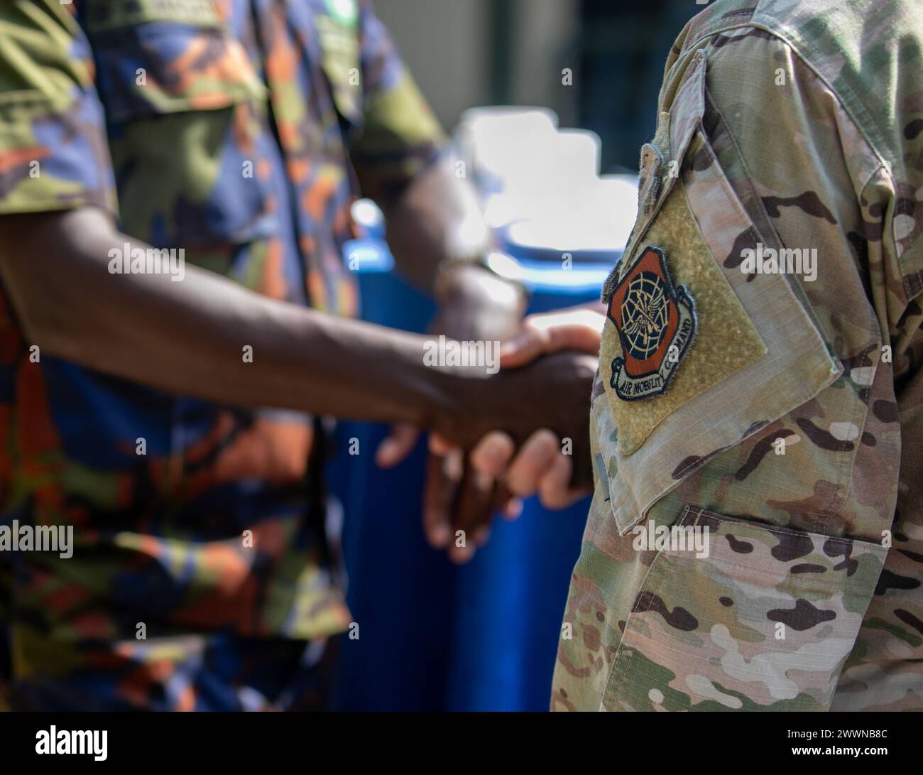 Kenyan Air Force Major Bethuel Masai shakes hands with U.S. Air Force ...