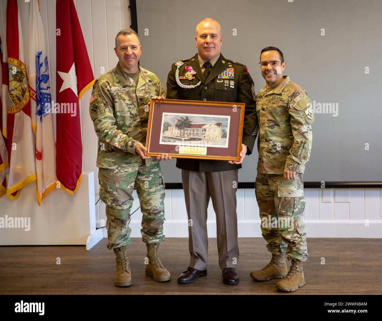The Florida National Guard (FLNG) Chief of Staff, Col. Felix A. Rodriguez, and the prior Chief ...