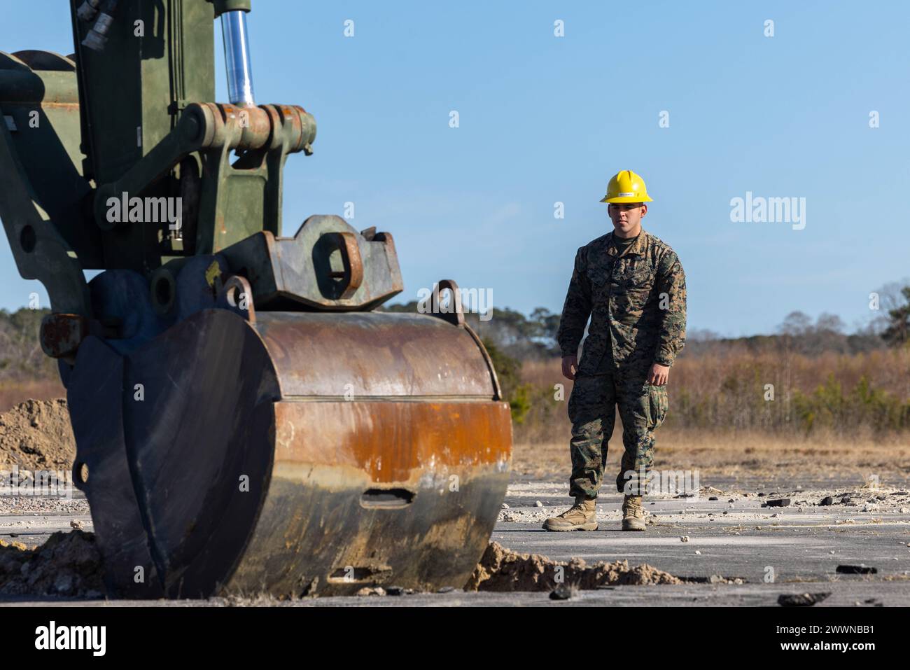 From the ground, U.S. Marine Corps Edward Guerra, a combat engineer ...