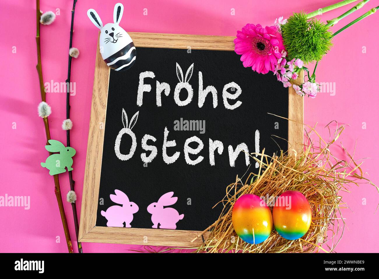 March 25, 2024: Happy Easter Greeting on a chalkboard with colorful ...