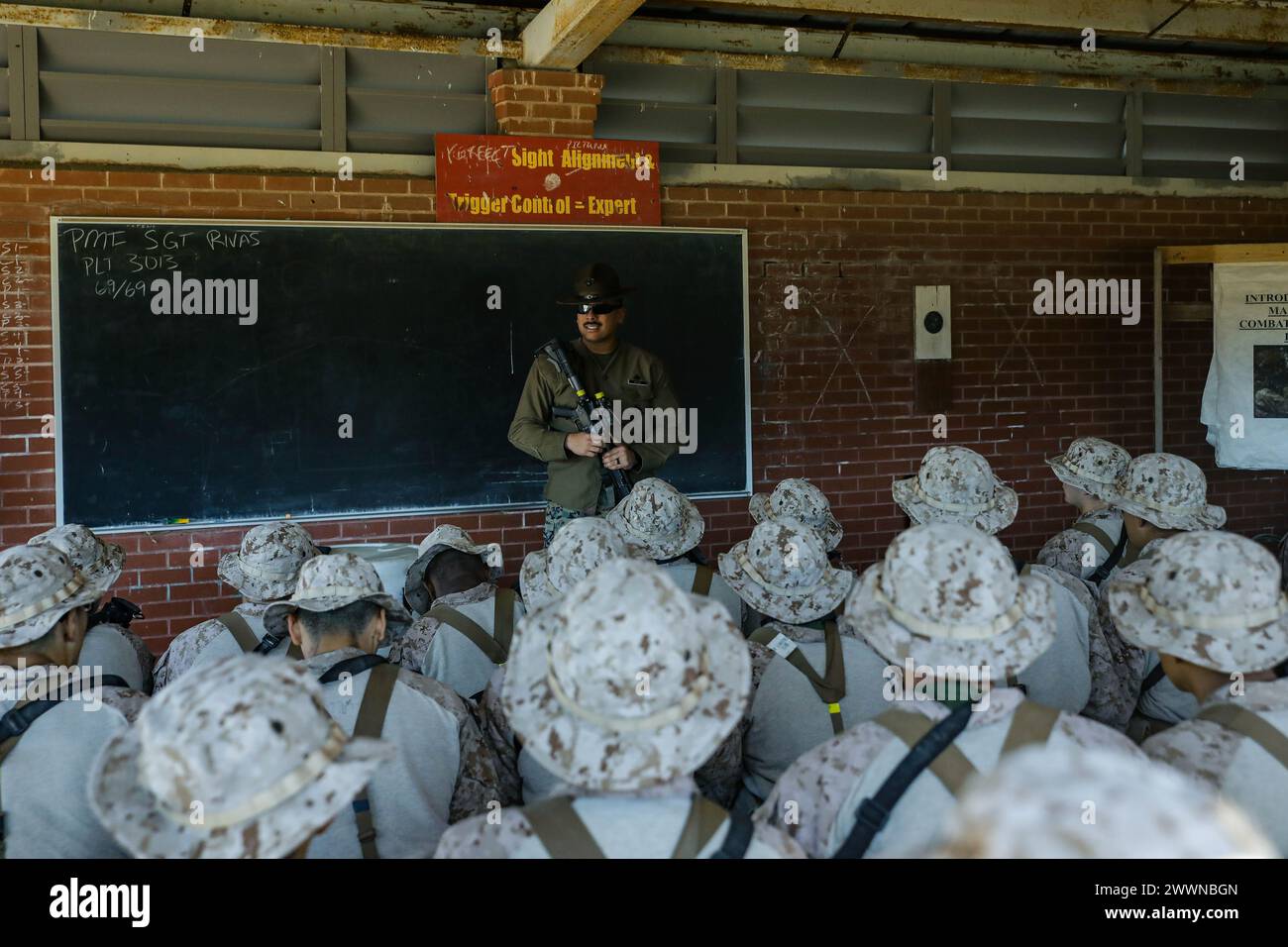 Recruits with Kilo Company, 3rd Recruit Training Battalion, receive ...