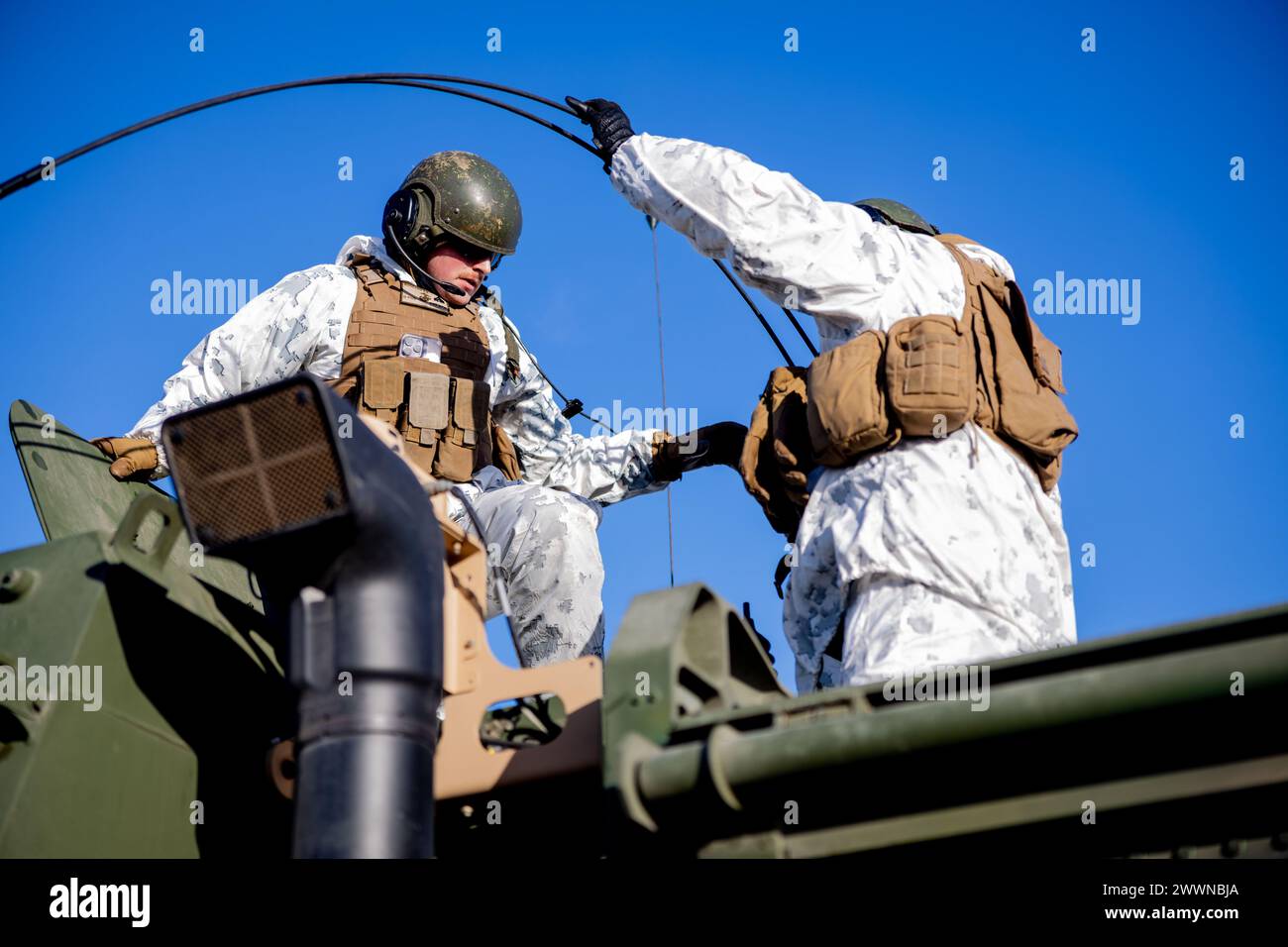 U.S. Marine Corps Cpl. Zachary Woodard (left) and Sgt. Mitchell Hoffman ...