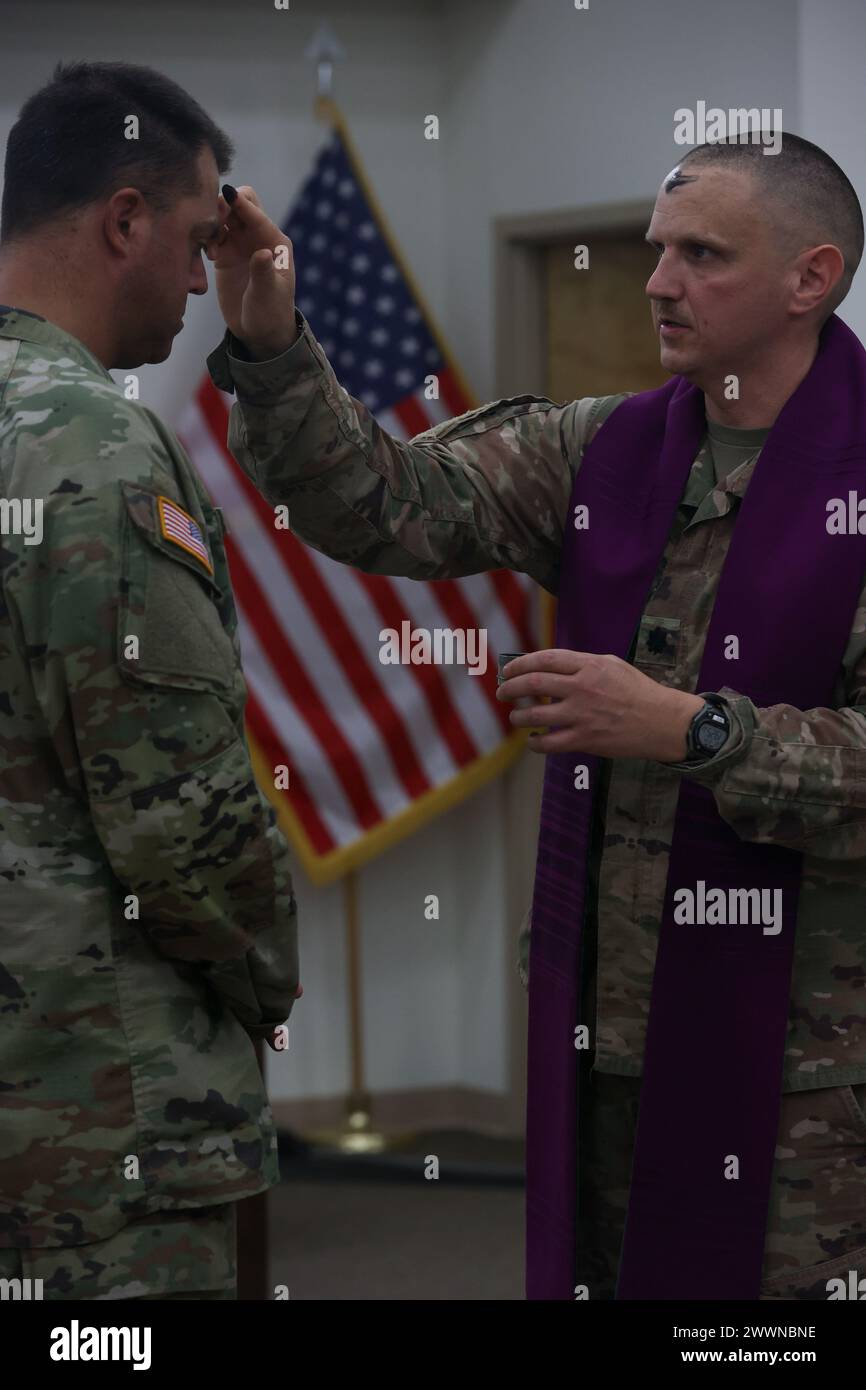 Chaplain Lt. Col. Jeremy Pedersen, leads an Ash Wednesday Protestant ...