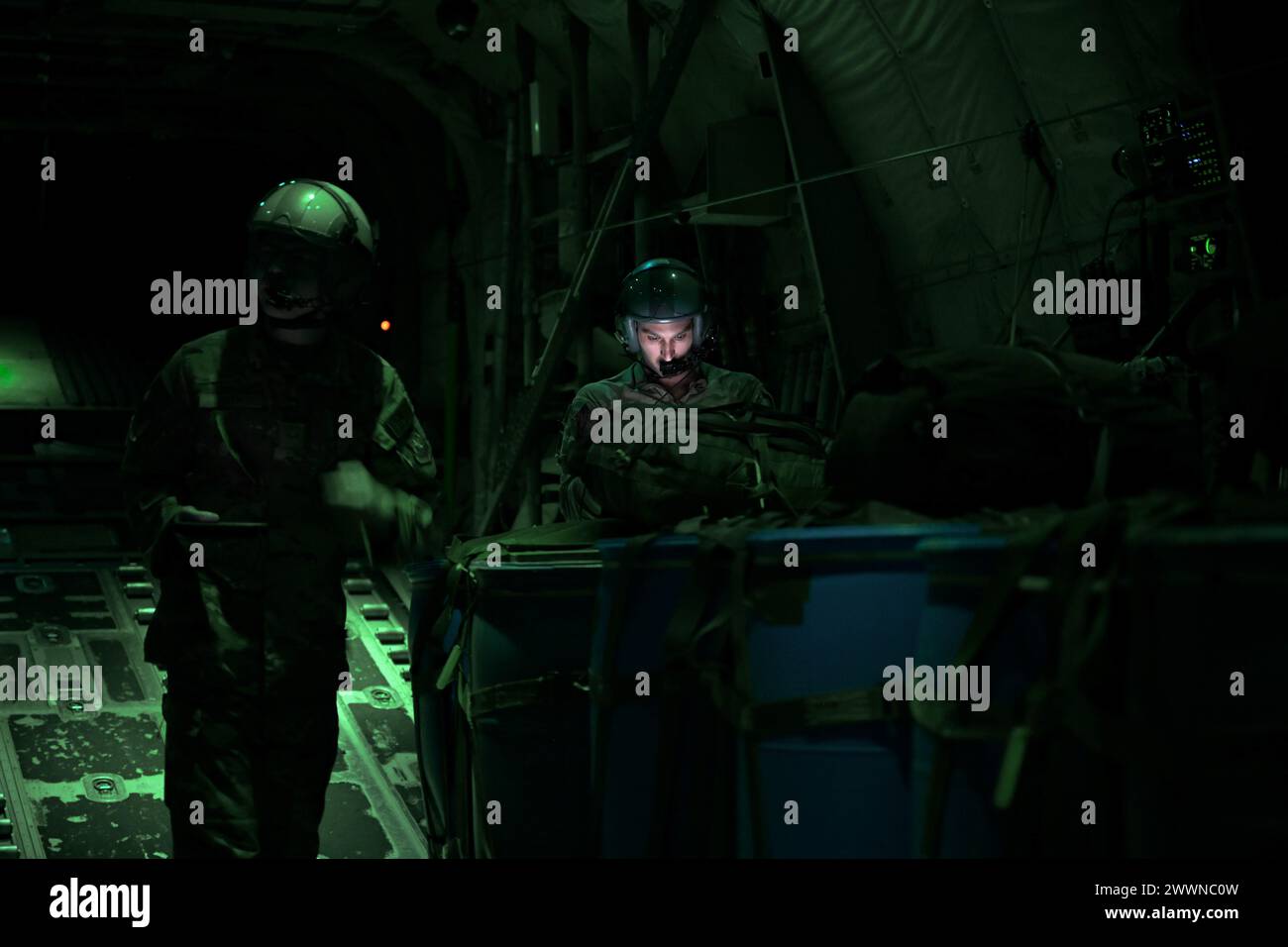 Loadmasters assigned to the 41st Airlift Squadron prepare for a mass ...