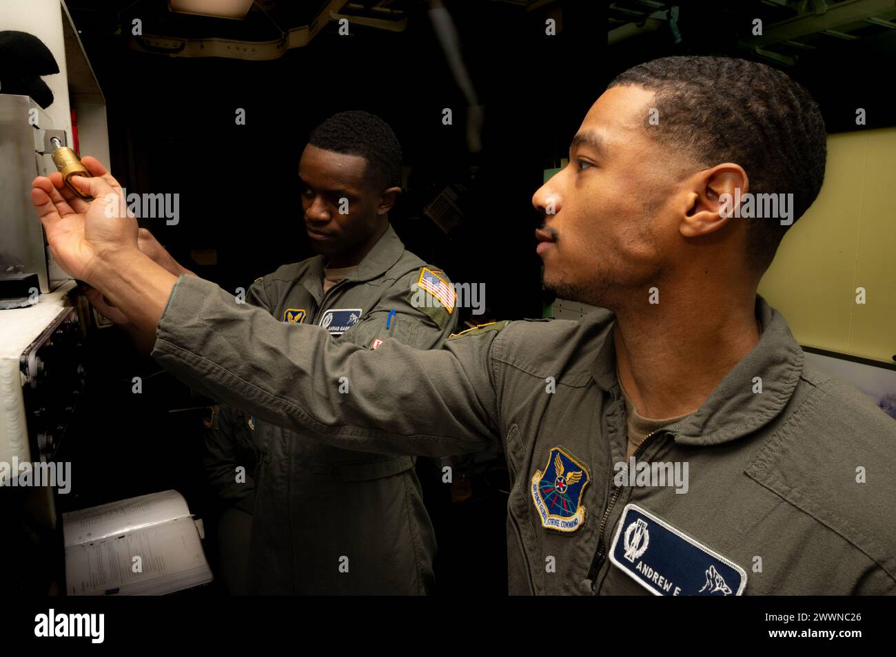 U.S. Air Force Capt. Andrew Gould, flight commander, and 2nd Lt. Ahmad ...