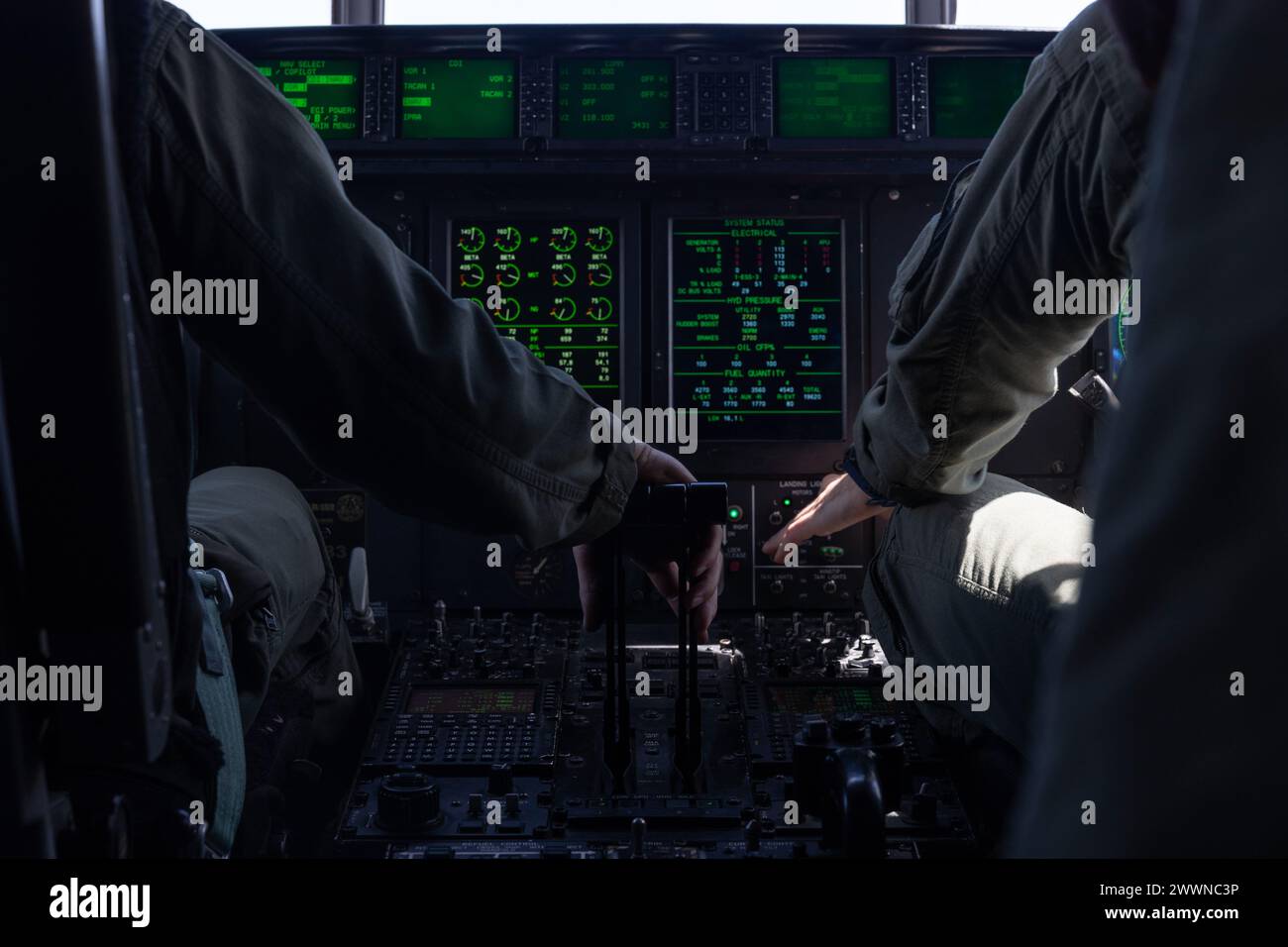U.S. Marines Corps Capt. Aaron Royer, left, an aircraft commander, and ...