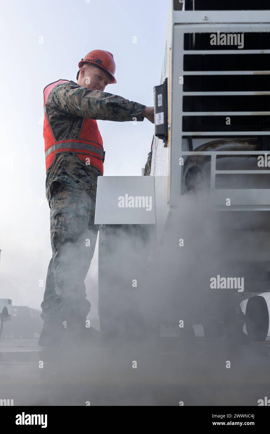 U.S. Marine Corps Sgt. Christopher Piper, cryogenics equipment operator ...