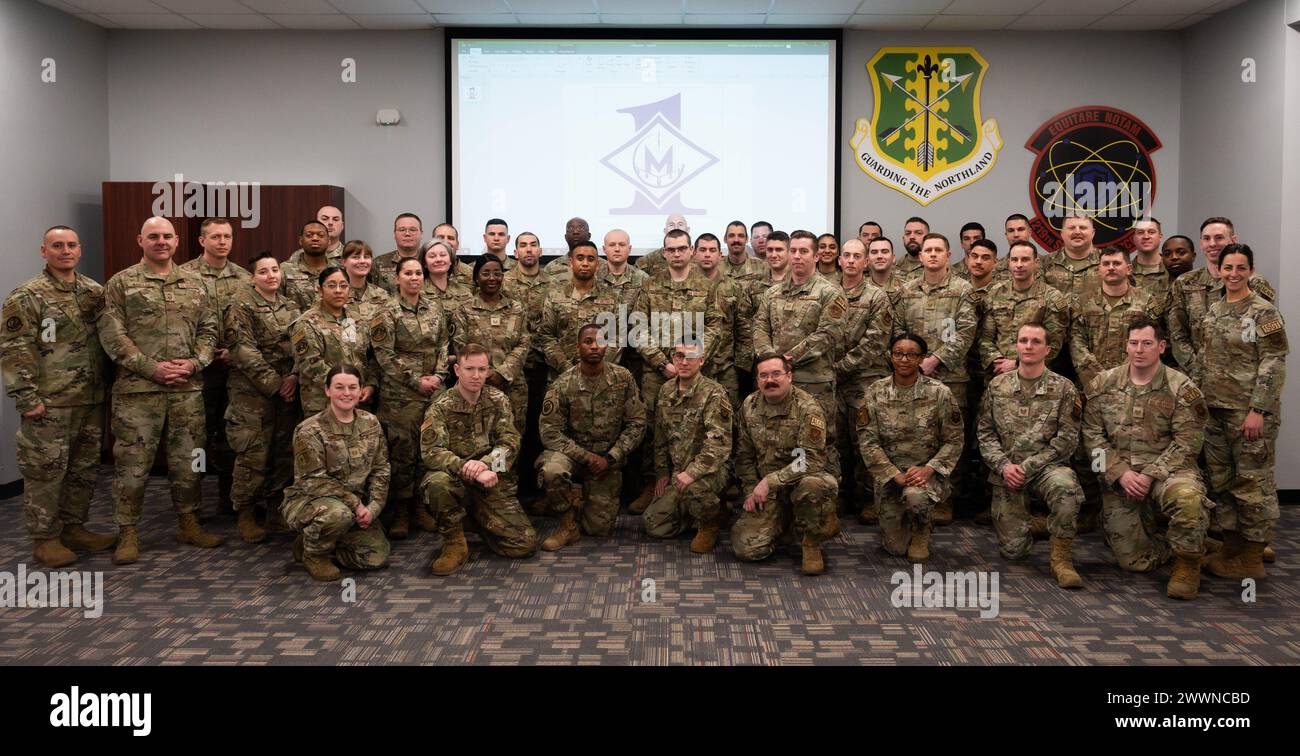 Members of Team Minot attending the First Sergeant Symposium pose for a ...