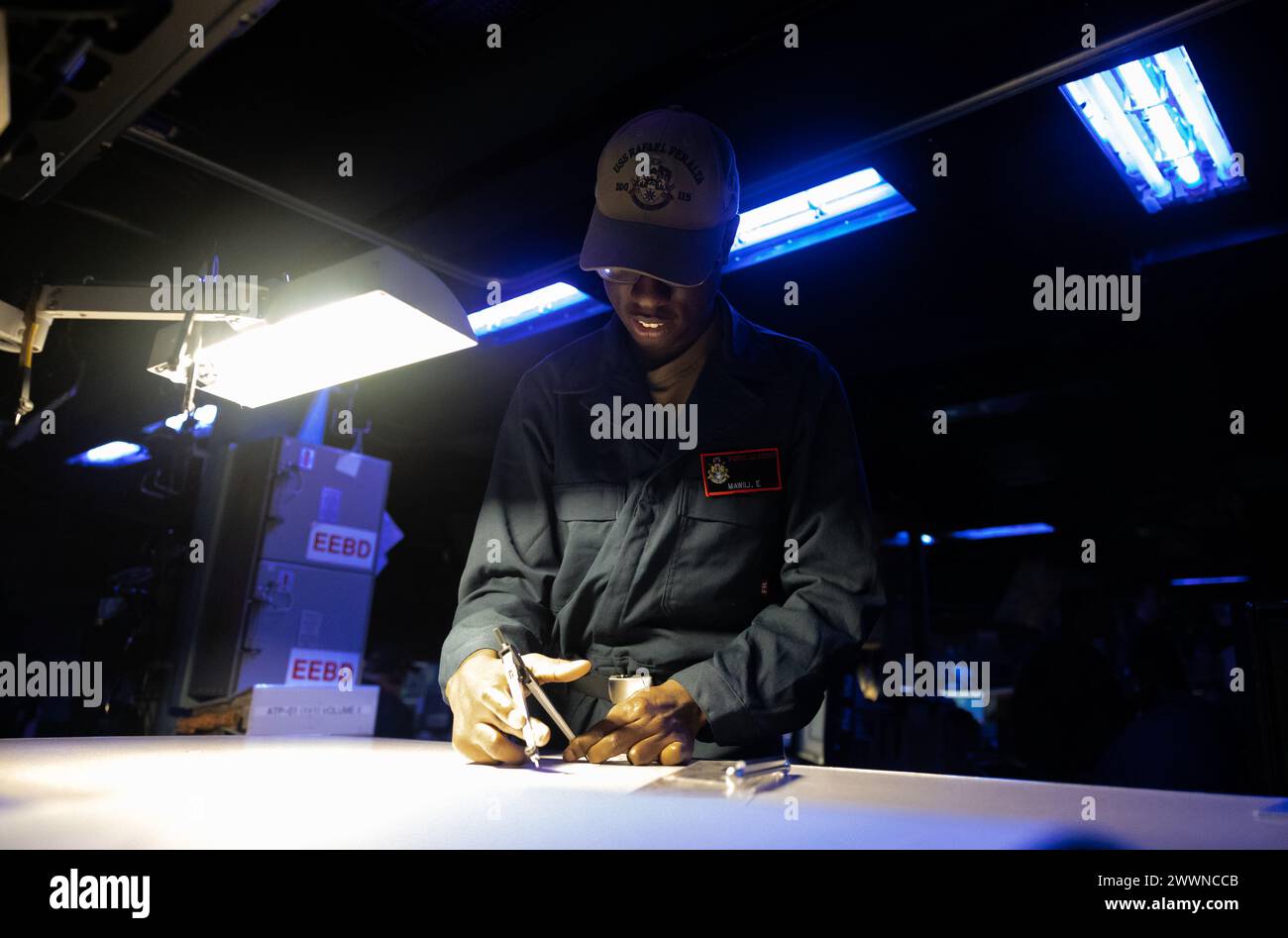 PHILIPPINE SEA (Feb. 1, 2024) Seaman Recruit Elijah Mawuli stands watch ...