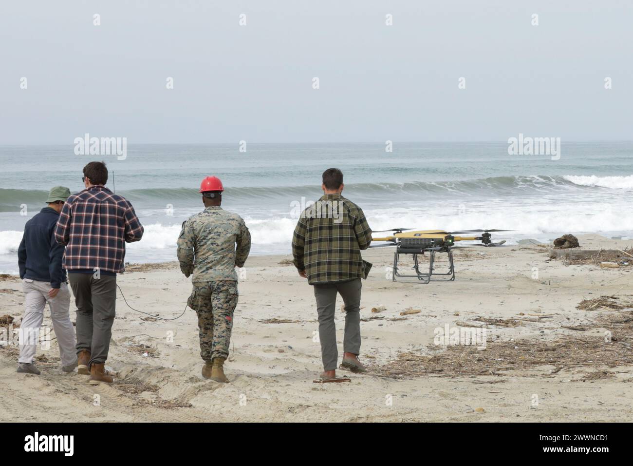 Marine alongside U.S. Army civilians assigned to the U.S. Army Combat ...