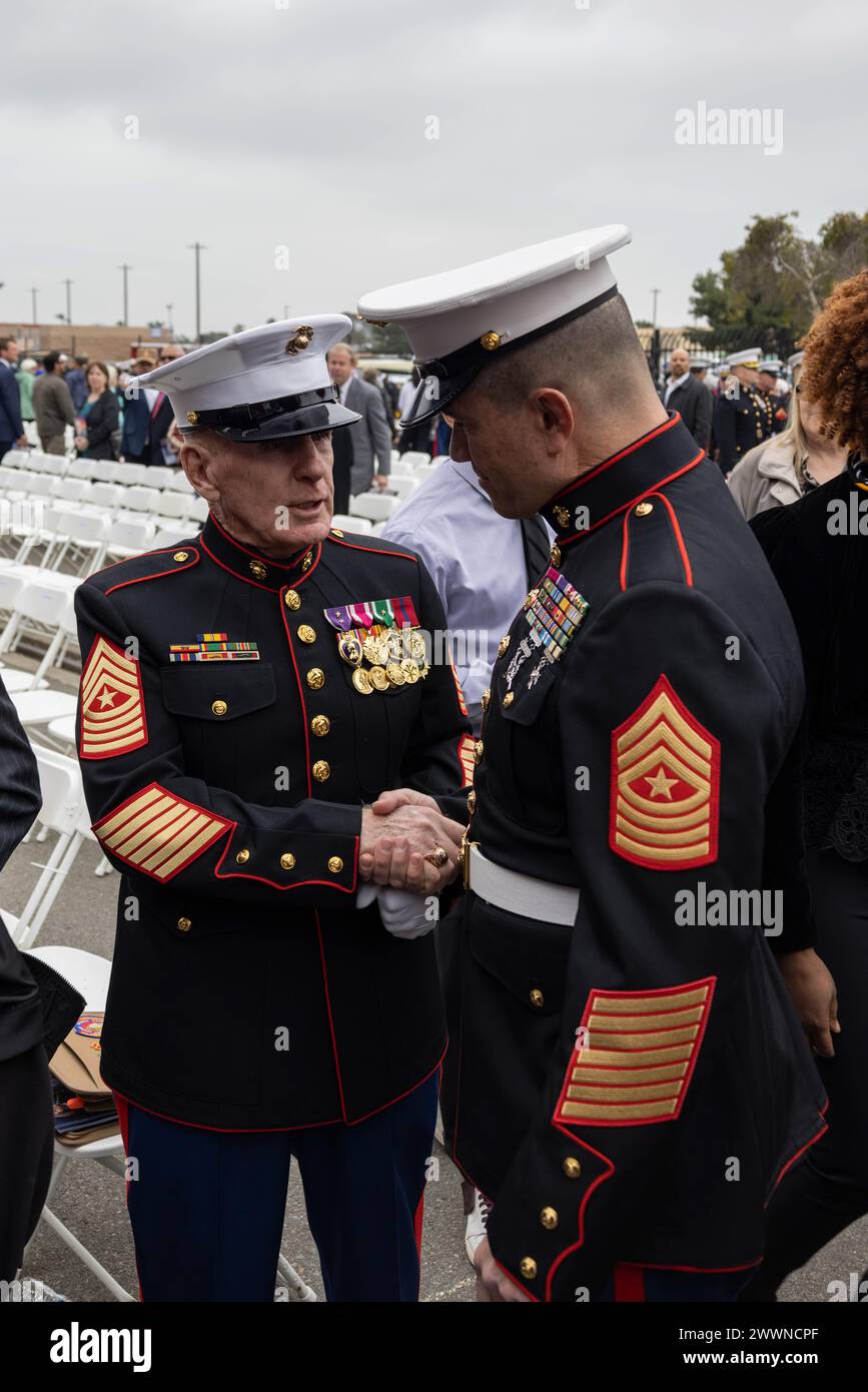 Retired U.S. Marine Corps Sgt. Maj. Edward F. Neas Sr., left, shakes ...