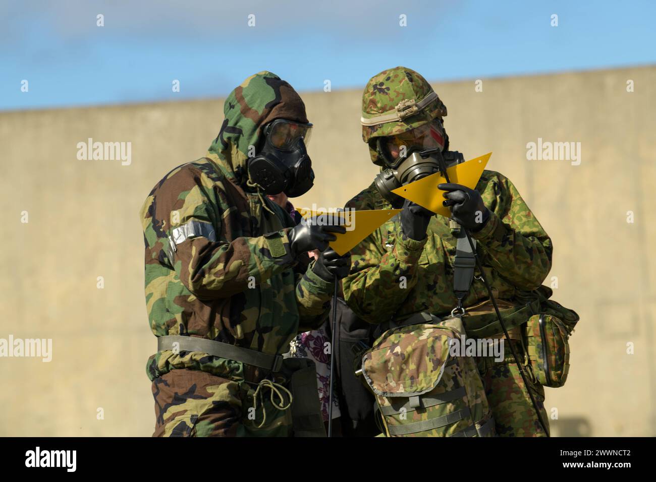 A U.S. Army Soldier, left, and a Japan Ground Self-Defense Force member ...