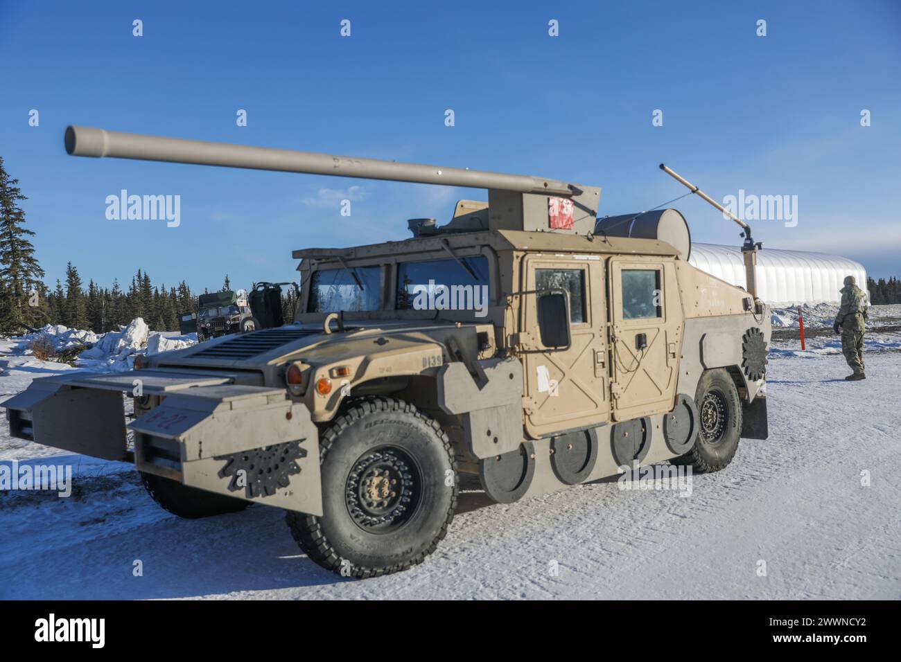 A High Mobility Multipurpose Wheeled Vehicle (HMMWV) is modified by the ...