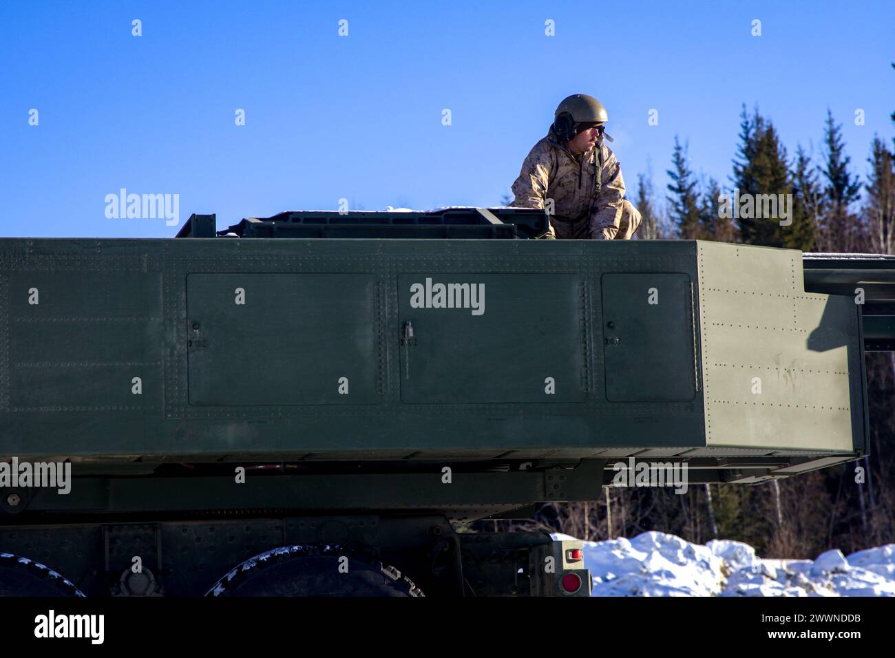 U.S. Marine Corps Cpl. Joshua Emmons, a High Mobility Artillery Rocket ...
