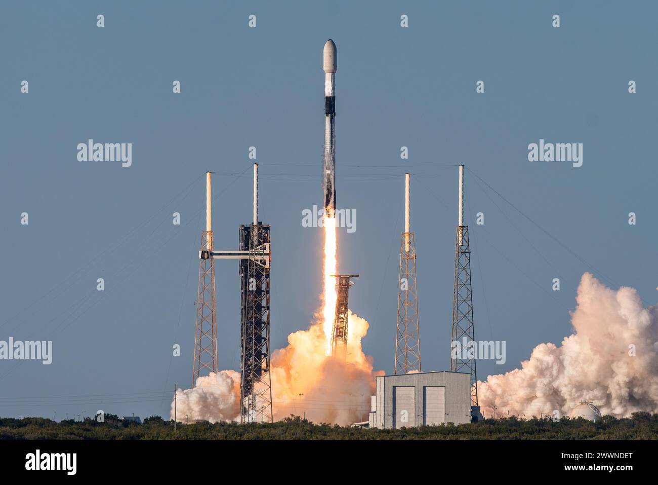 A Falcon 9 rocket carrying 24 Starlink satellites launches from Space ...