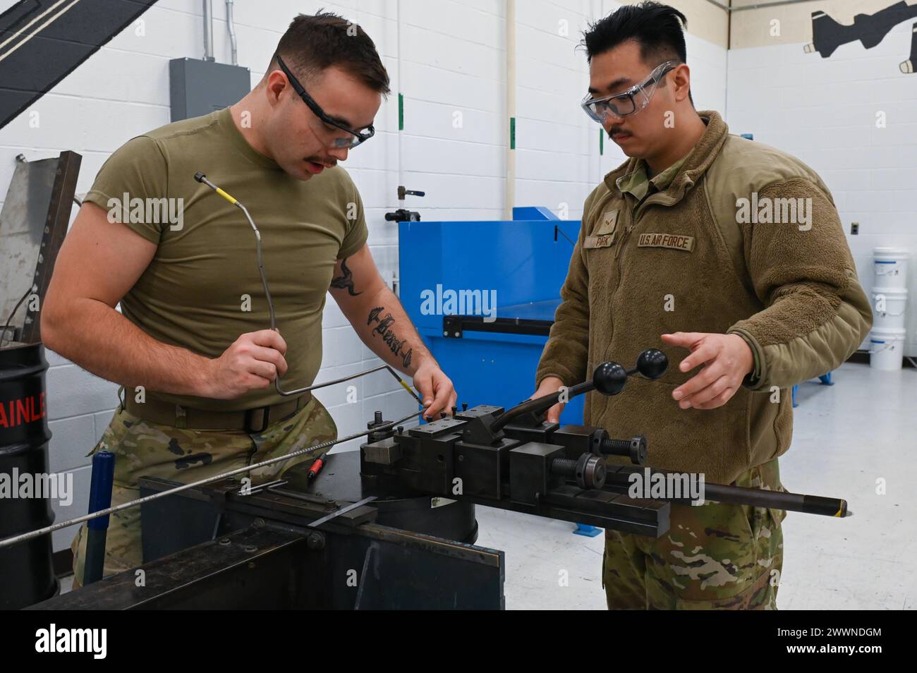 U.S. Airmen 1st Class Luke Parkes and Rae Park, 509th Maintenance Group ...