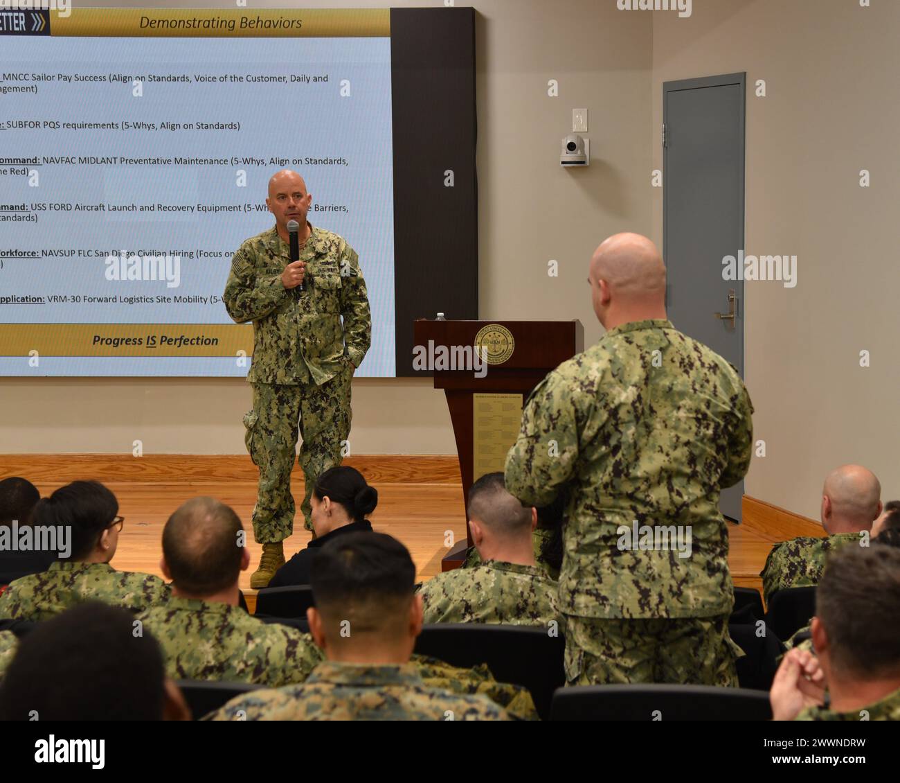 Vice Chief of Naval Operations Admiral James W. Kilby listens to a ...