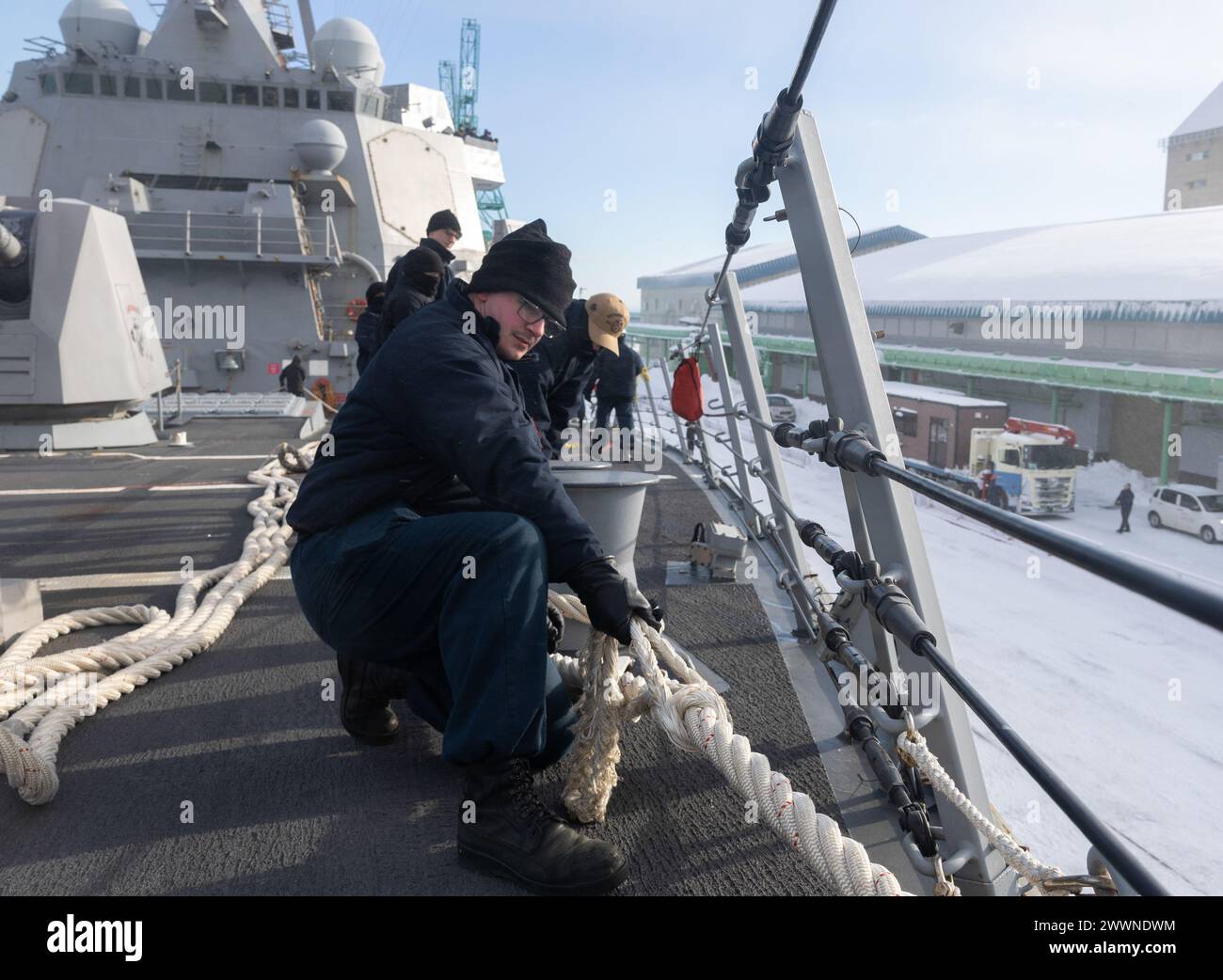 OTARU, Japan (Feb. 05, 2024) Sailors handle lines during Sea and Anchor ...