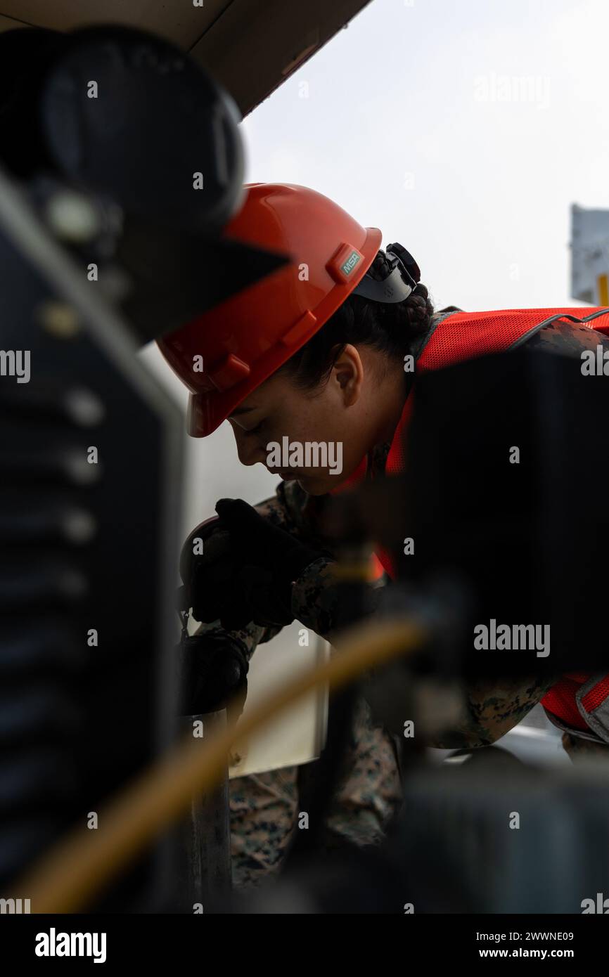 U.S. Marine Corps Lance Cpl. Claudia Hernandez, an aircraft maintenance ...