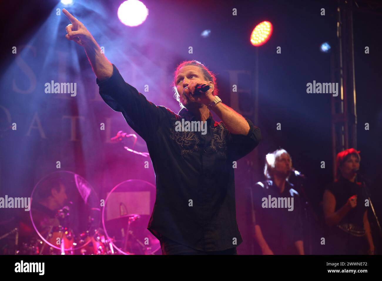 Jeff Vizain, vocalist and musician, Lt. Dan Band, performs for military ...