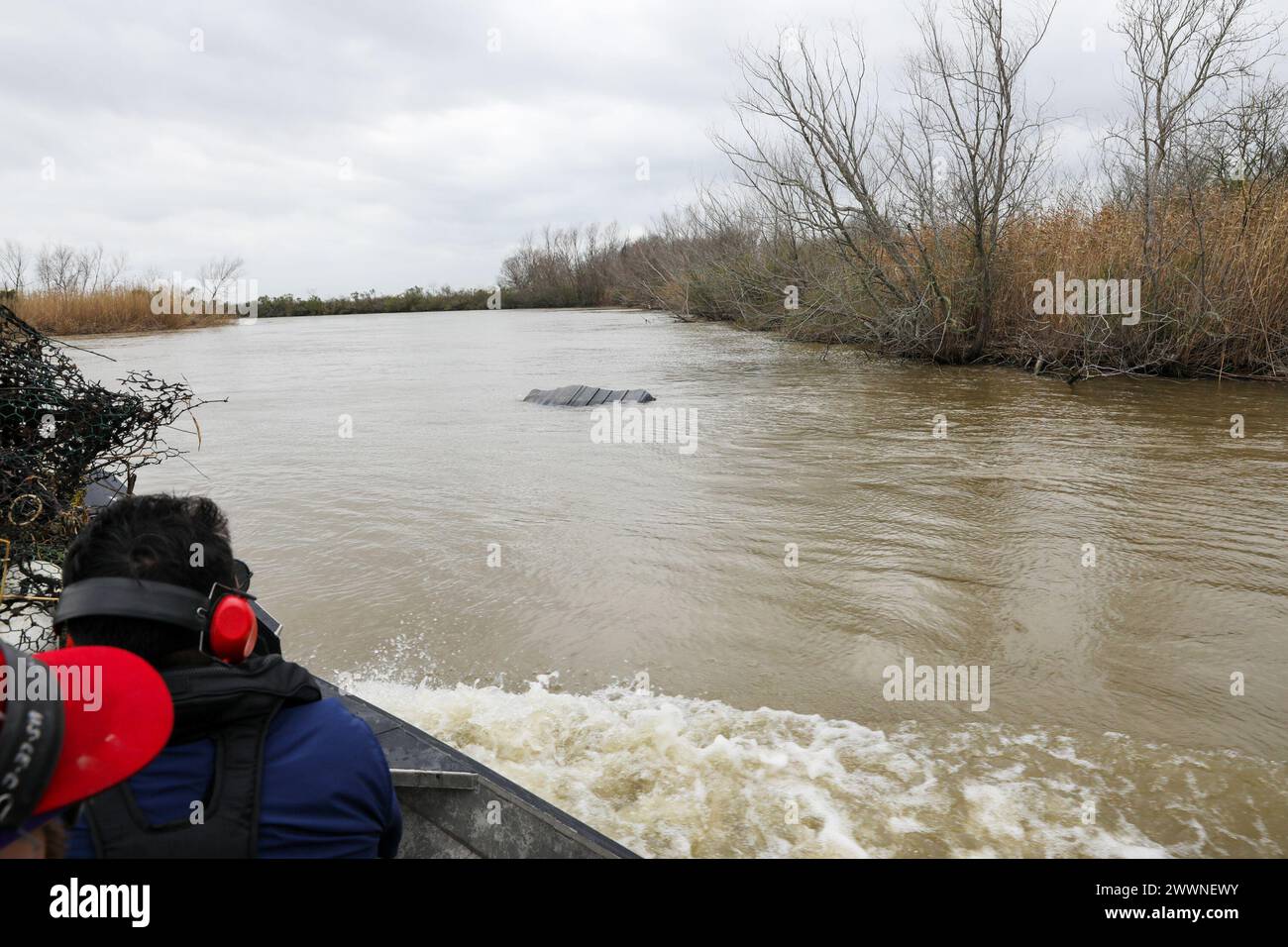 Obed Contreras-Sosa, USACE, SWG heavy equipment operator, observes a ...