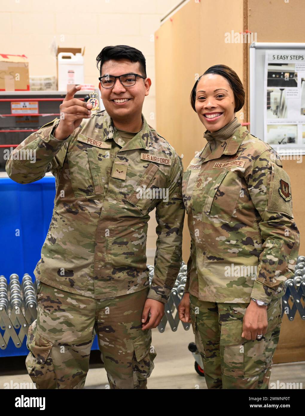 U.S. Air Force Airman 1st Class Christopher Perez, left, 100th Force ...