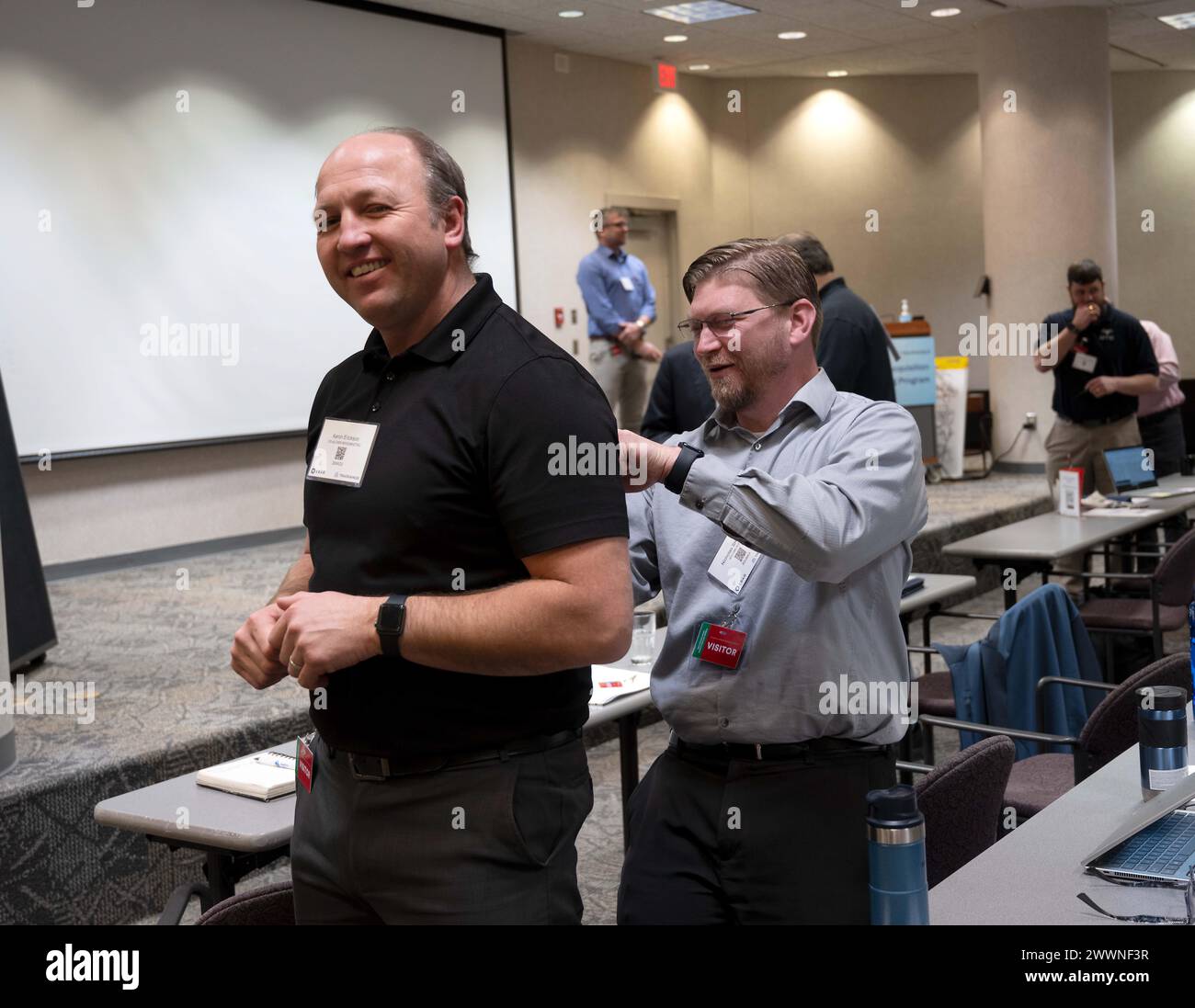 Aaron Erickson, left, and Nicholas Shouse, participate in group ...