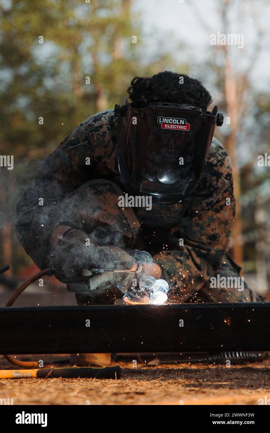 U.S. Marine Corps Lance Cpl. Kyara Lozada, a metal worker with Marine ...