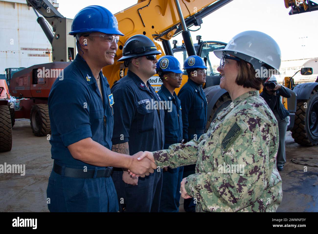 Chief of Naval Operations (CNO) Adm. Lisa Franchetti, right, shakes ...