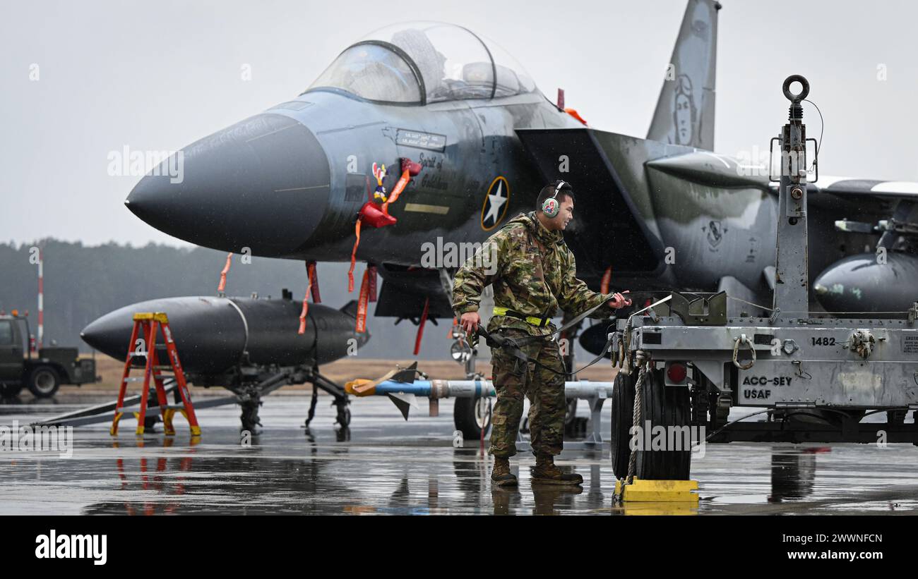 U.S. Air Force Staff Sgt. Jeffrey Pagtama, a weapons load crew chief ...