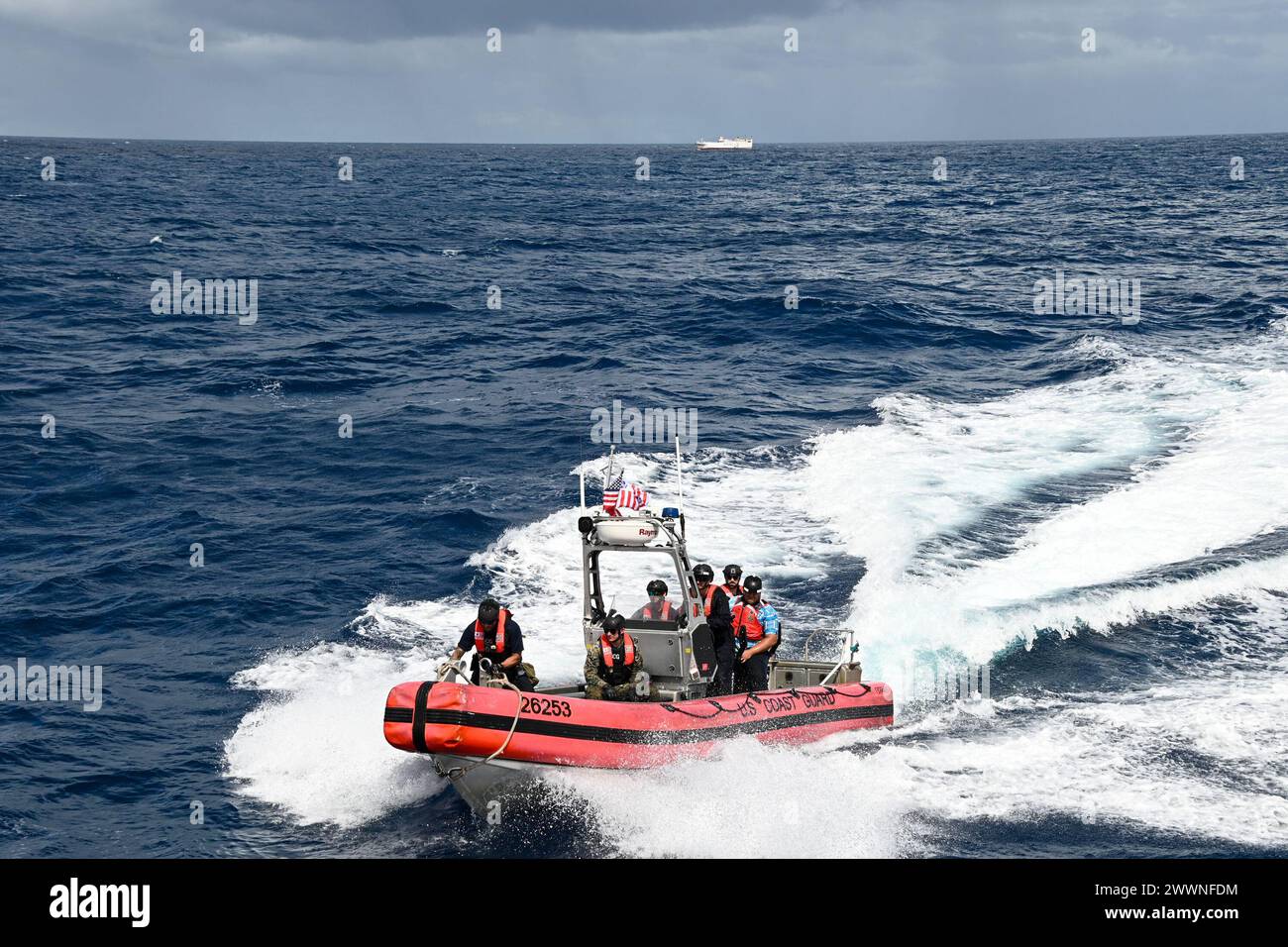 A U.S. Coast Guard Cutter Harriet Lane (WMEC 903) small boat crew and ...