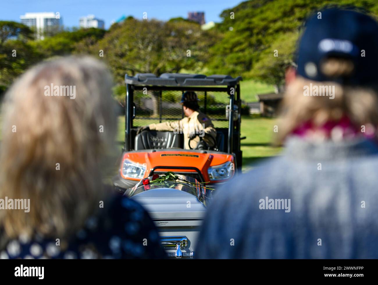 Family members of U.S. Army Cpl. Adin C. Norris Jr., watch as his ...