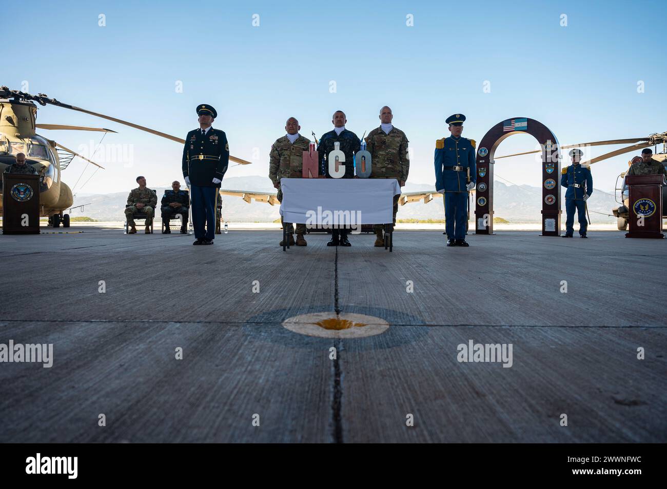 Members of Joint Task Force-Bravo and the Honduran Air Force stand ...