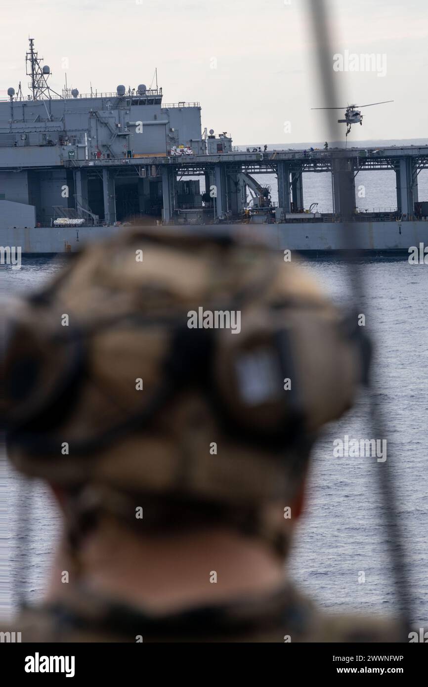 U.S. Marine Corps Sgt. Alec Hunter, a scout sniper with Battalion Landing Team 1/1, 31st Marine ...