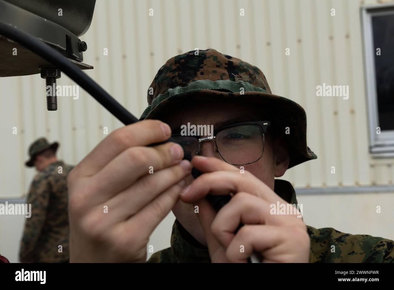 U.S. Marine Corps Lance Cpl. Mason Dinges, an intelligence specialist ...