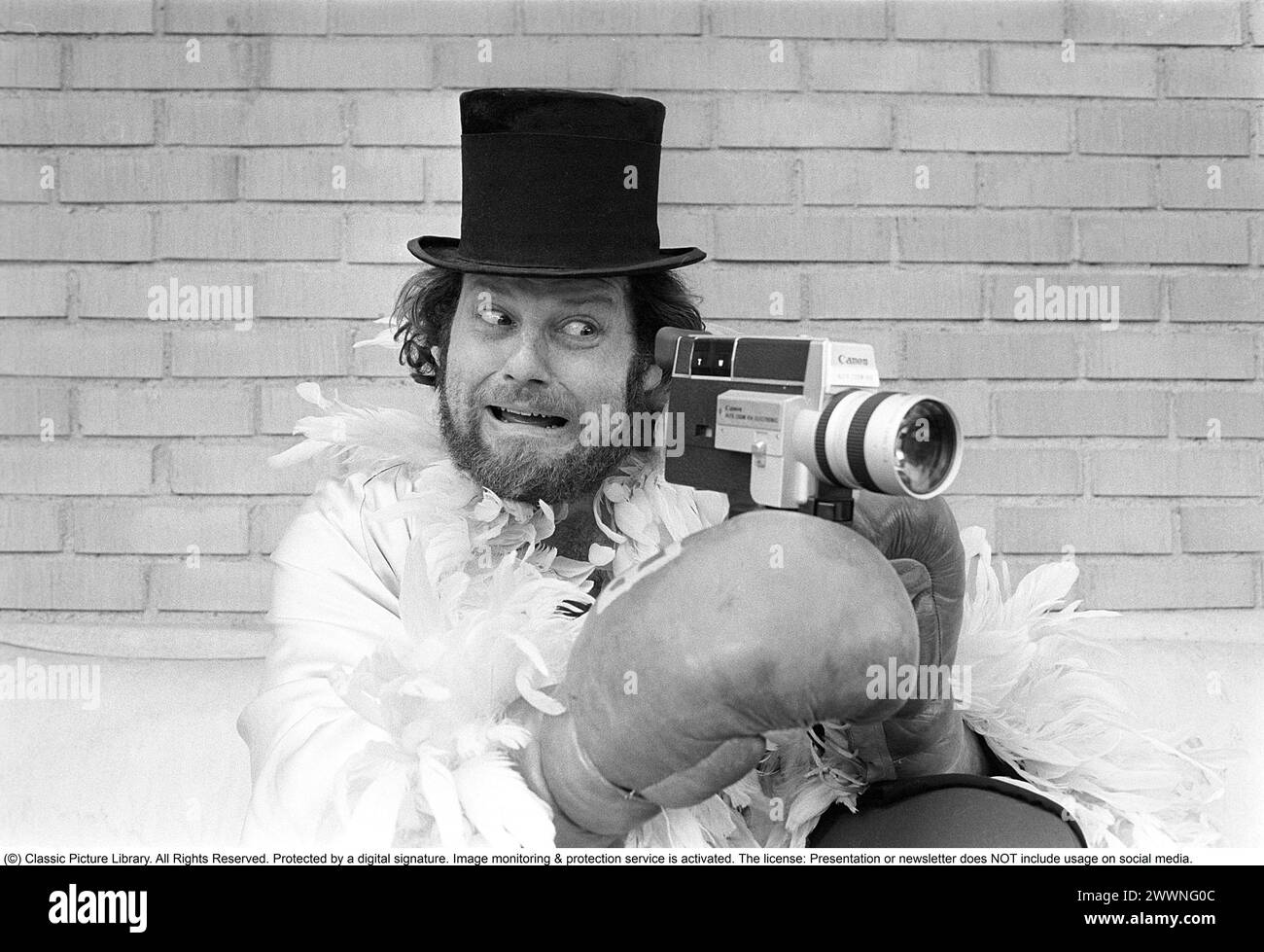 In the 1970s. A man is filming with a amateur film camera. The film was ...