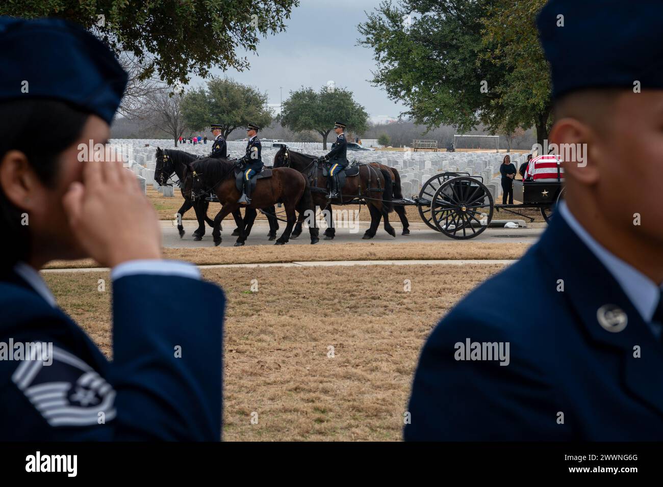 The Fort Sam Houston Caisson Section carry the flag-draped casket of ...