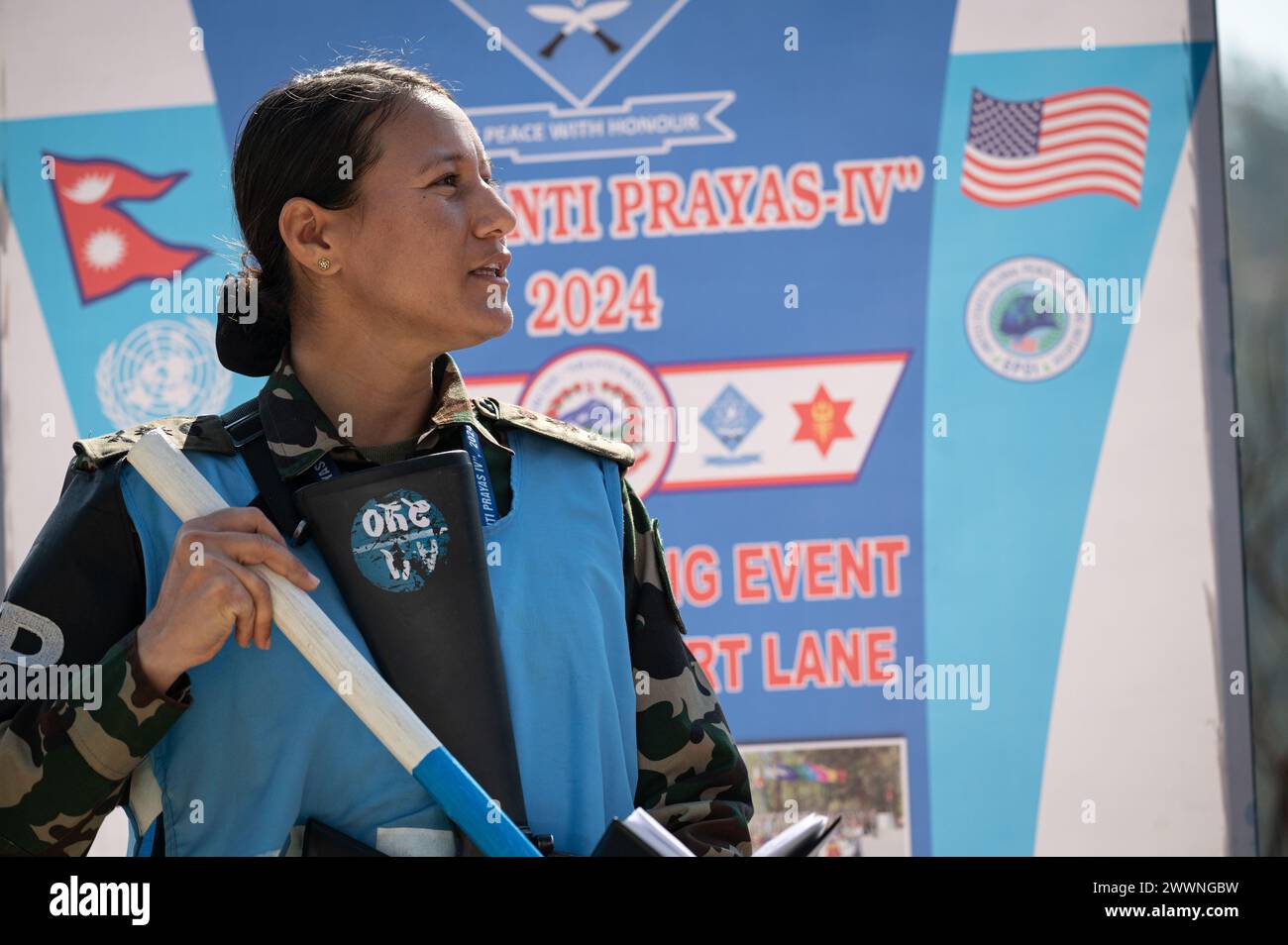 A member of the Nepali Army trains other soldiers during Multinational Peacekeeping Exercise ...