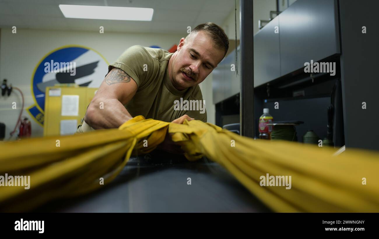 U.S. Air Force Airman 1st Class Marcus Kelley, aircrew flight equipment ...