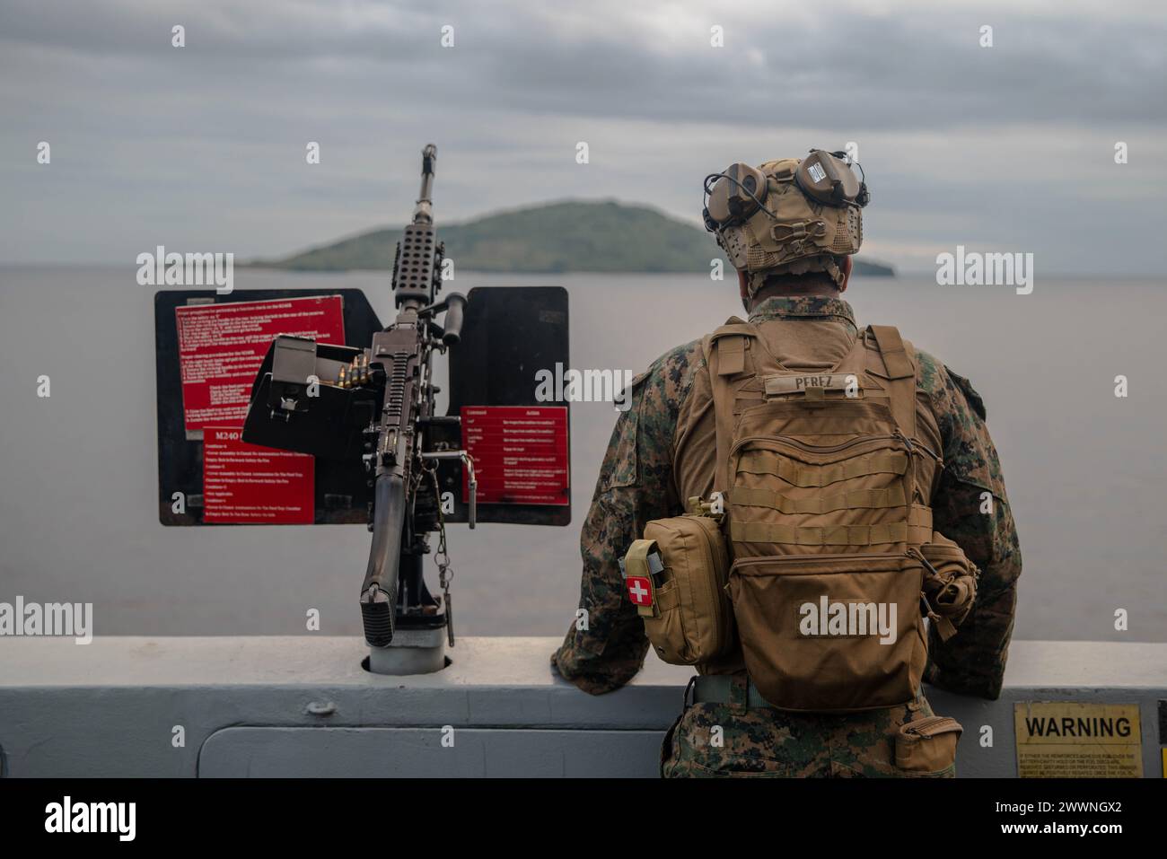 U.S. Marine Corps Lance Cpl. Angel Perez, a machine gunner assigned to ...