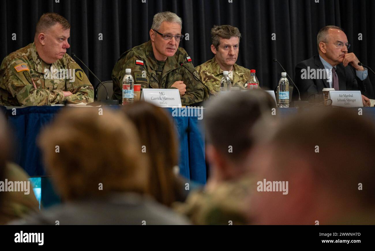 (From left) U.S. Army Maj. Gen. Garrick Harmon, deputy commanding ...