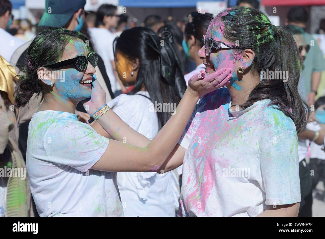 Indian and Nepalian people celebrating Festival of colors Holi at ...