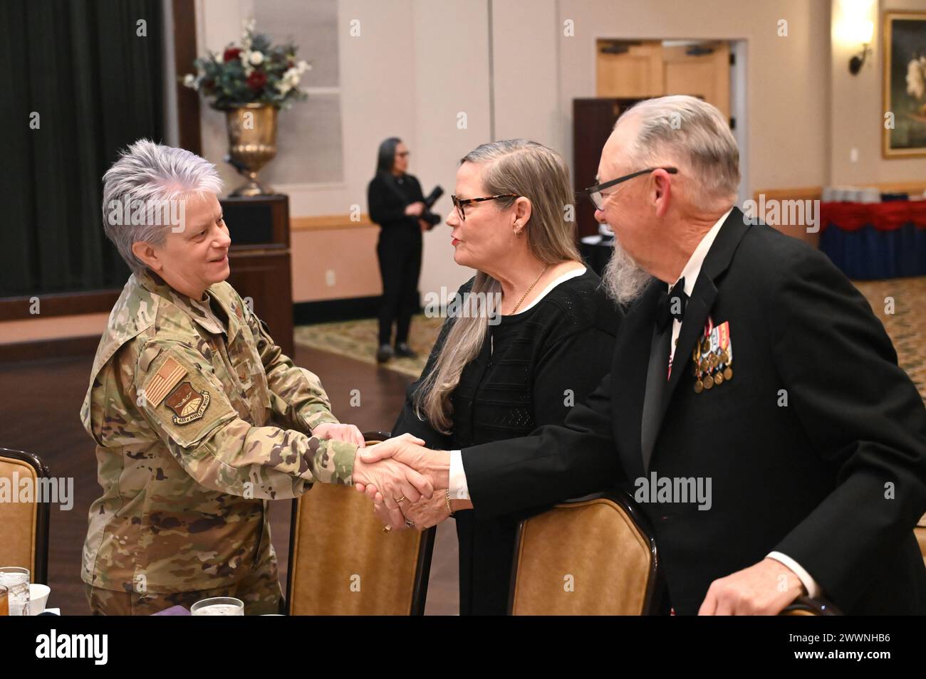 Maureen McAllen, left, 433rd Airlift Wing director of staff and retired ...