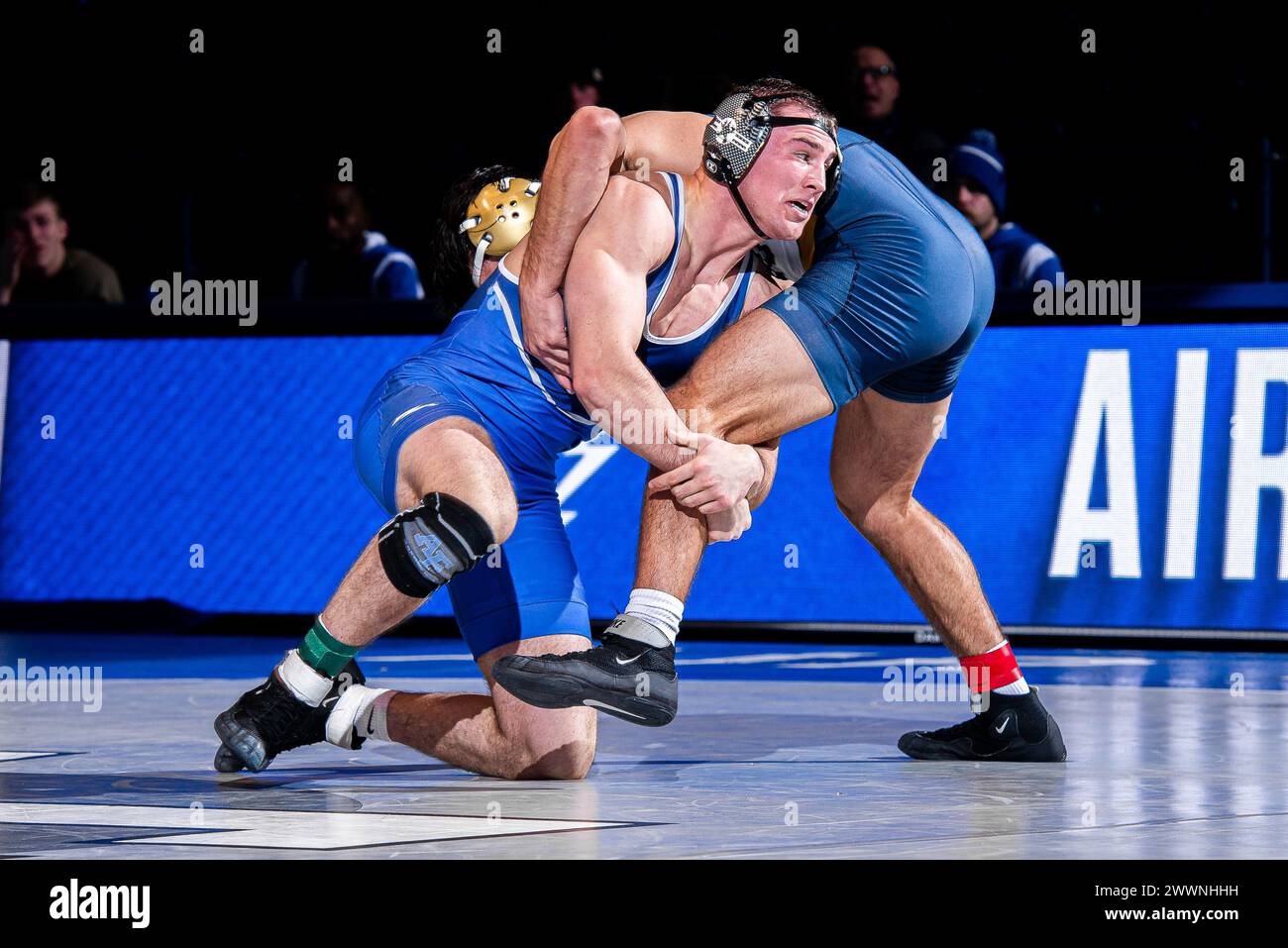 U.S. AIR FORCE ACADEMY, Colo. -- Air Force wrestler Sam Wolf shoots for ...